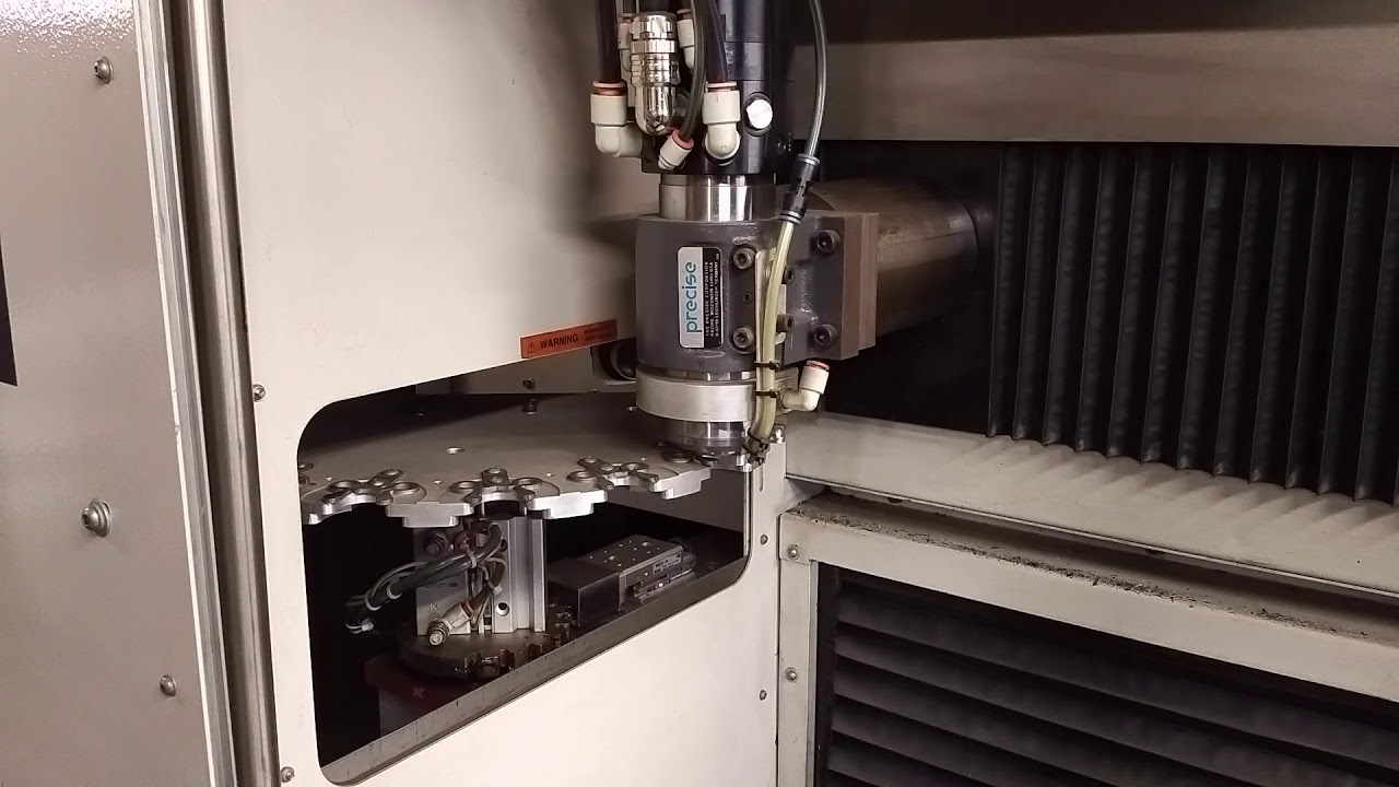 Defiance Innovations VMC doing an automatic tool change - YouTube