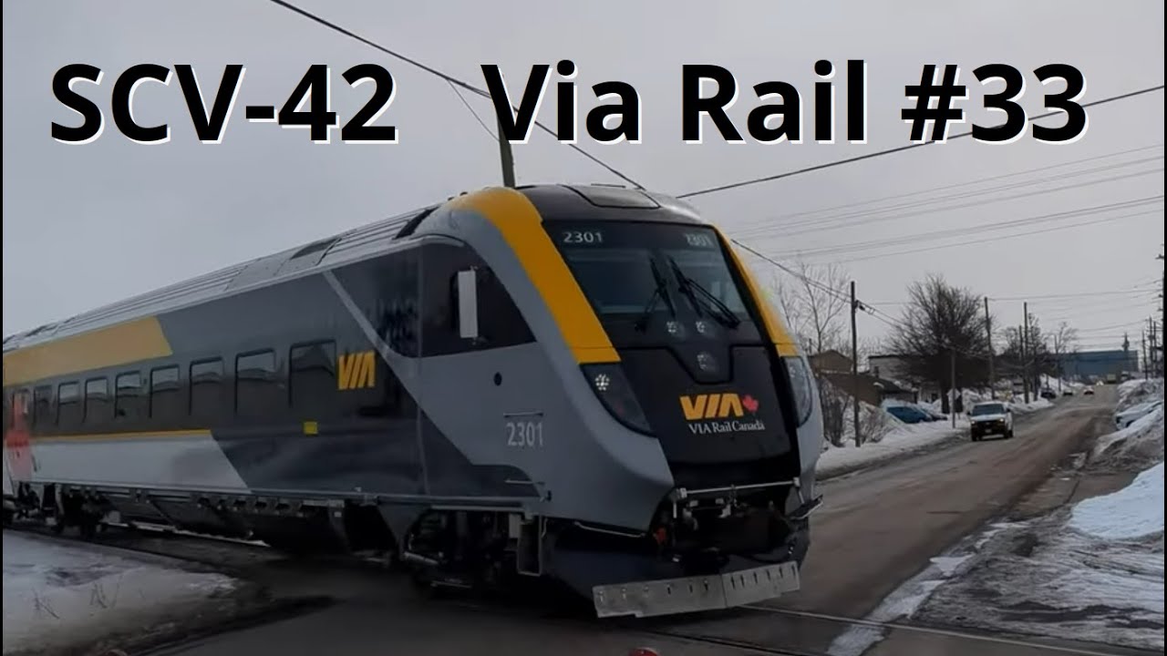 Charger at a level crossing | Via Rail SCV-42 #2202 pushes Train #33 ...
