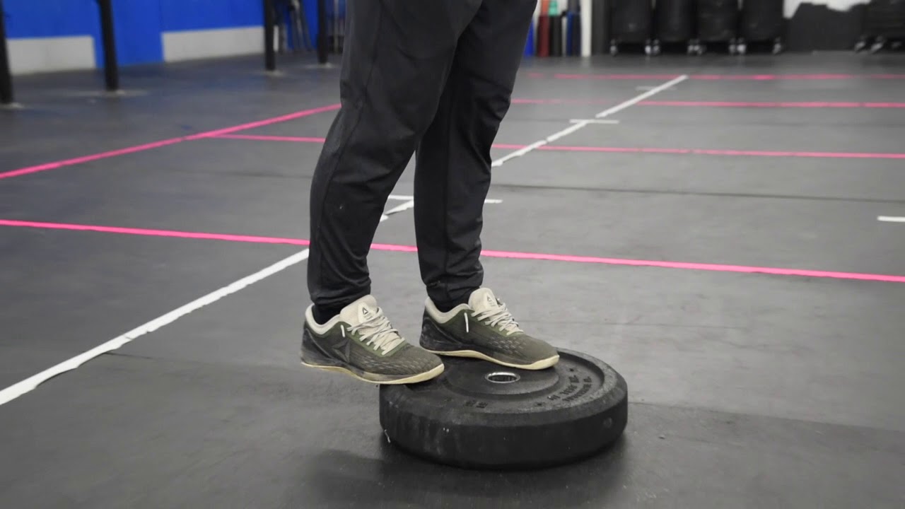Eccentric Ankle Dorsiflexion - YouTube