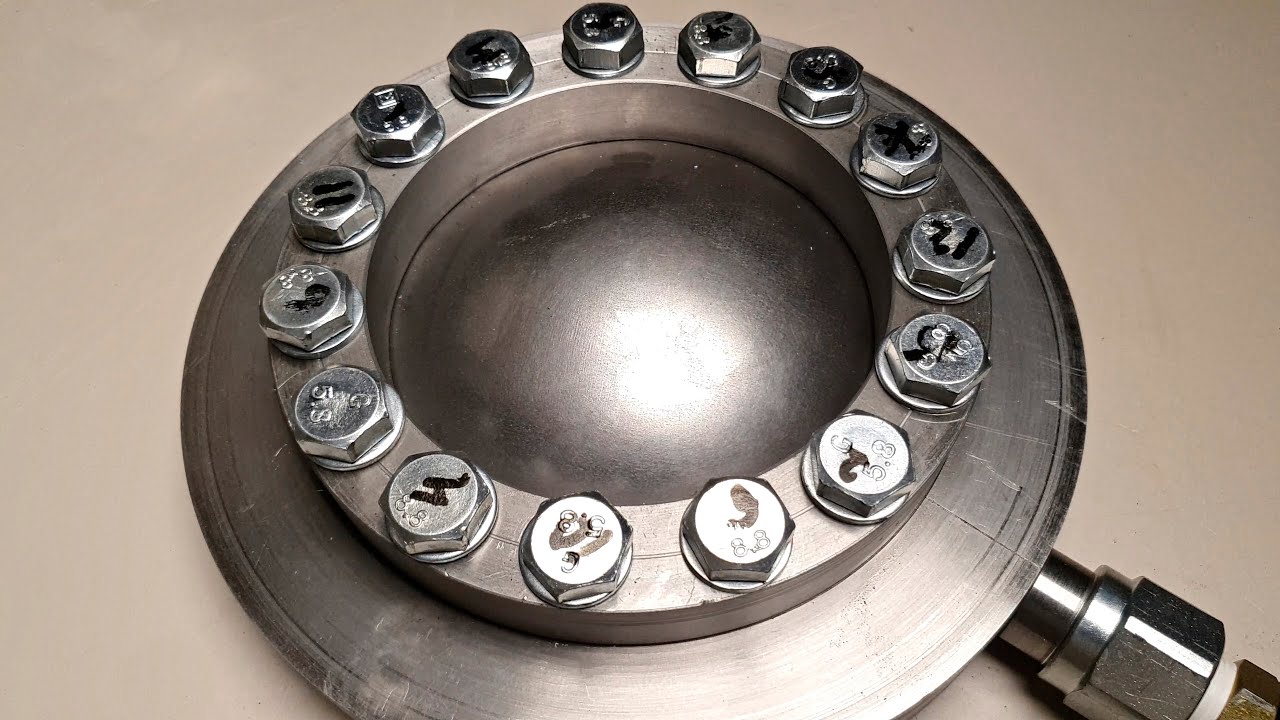 Inflating metal spheres. - YouTube