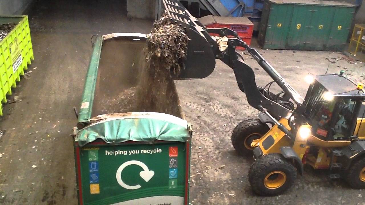 Case loading shovel in operation at Global Renewables - YouTube