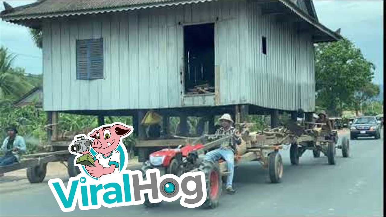 Moving a House on Tractors - YouTube