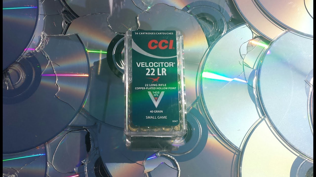 HOW MANY CDs WILL A .22lr BULLET GO THROUGH??? - YouTube