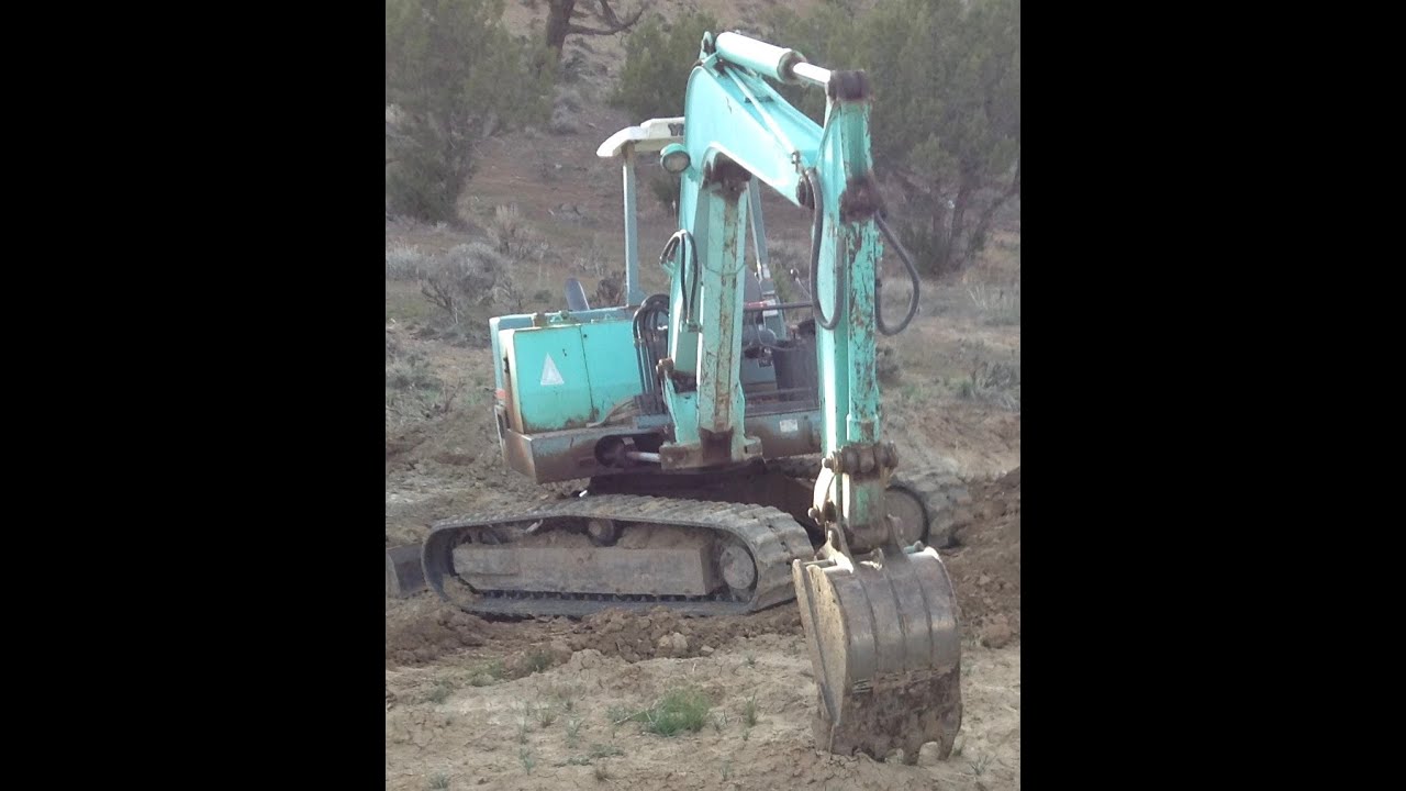 Yanmar Excavator Digging On The Building Pad - YouTube