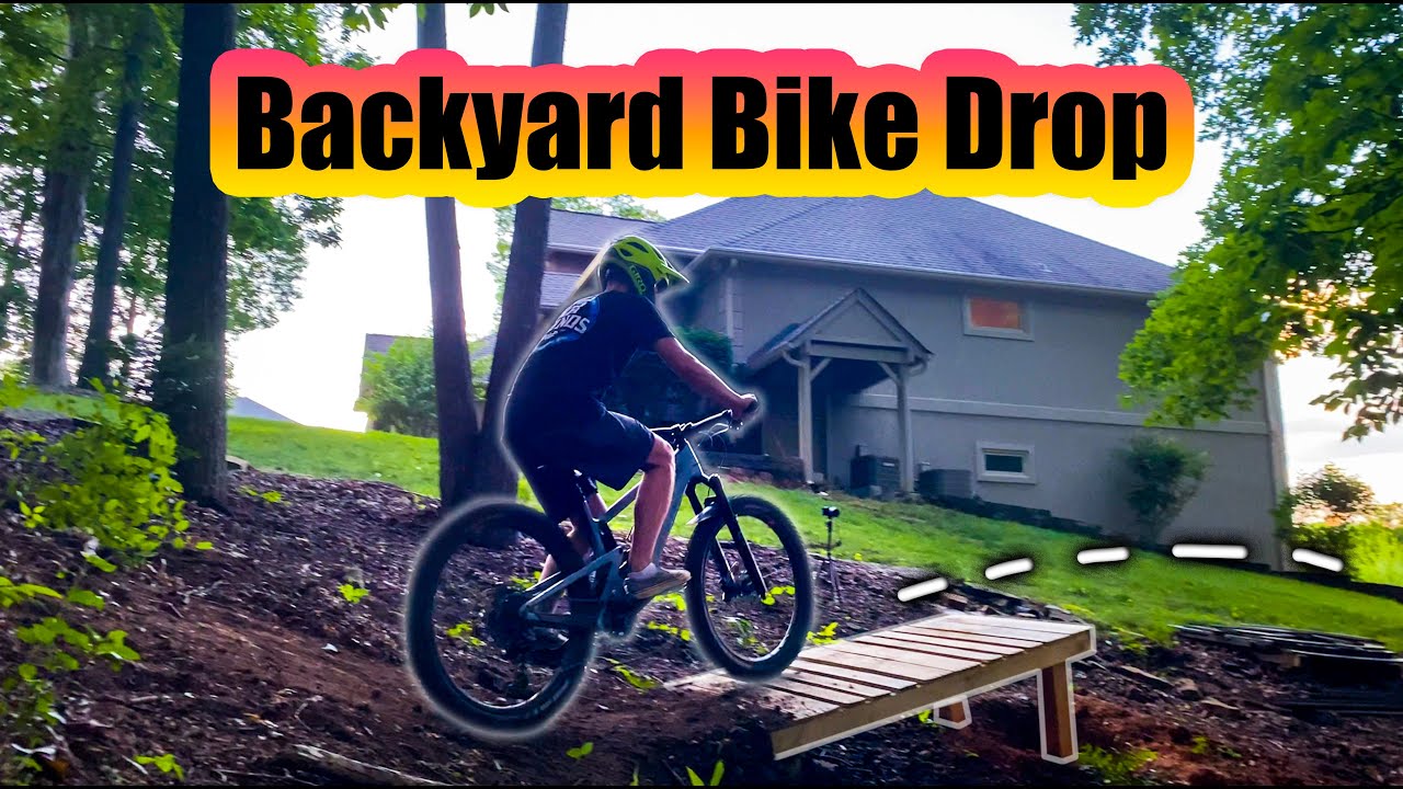 Building a Mountain Bike Drop in our Backyard! - YouTube