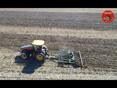 Versatile 335 Tractor pulling a Farmhand Chisel Plow - YouTube