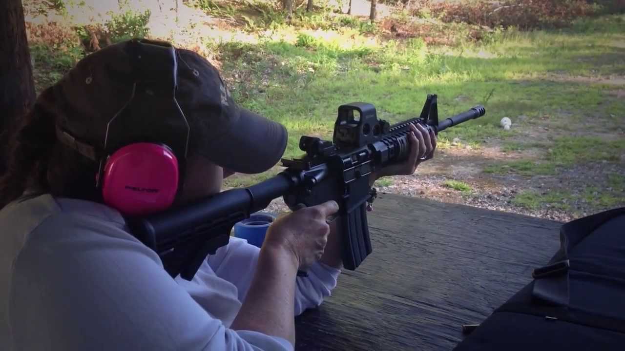 Woman shooting AR-15 for the first time - YouTube