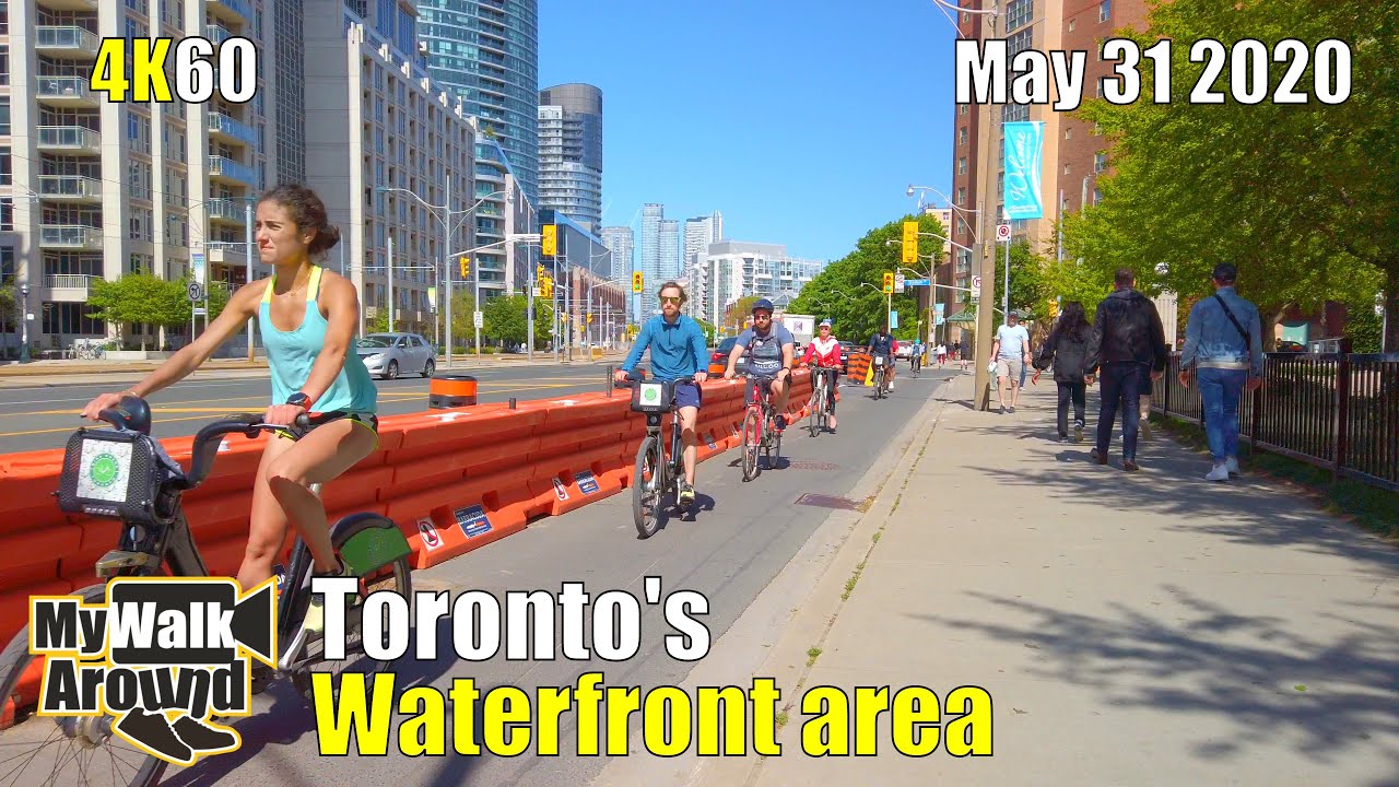 Toronto waterfront walk from Coronation Park to York street on sunny ...