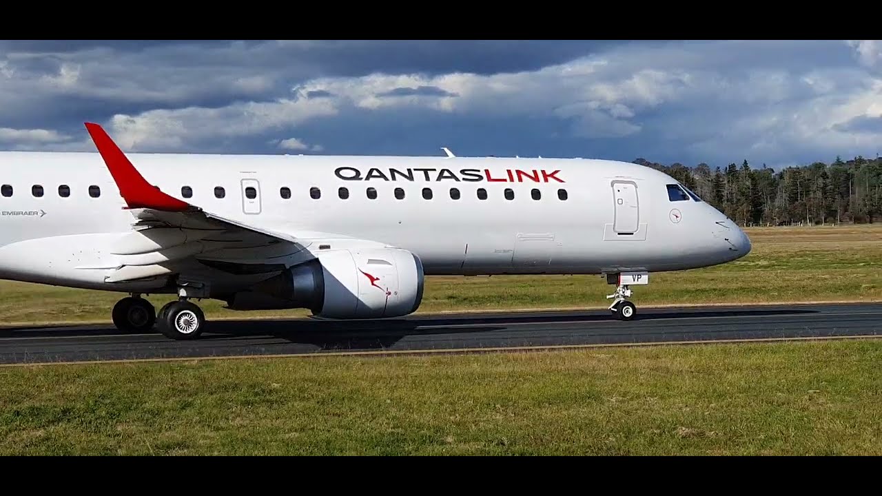 Qantas Link Embraer E190 taxy at Canberra airport follwed by a Virgin ...