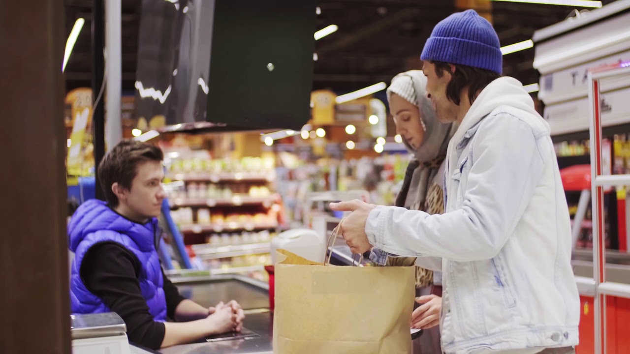 paying money in shop hd stock footage - YouTube