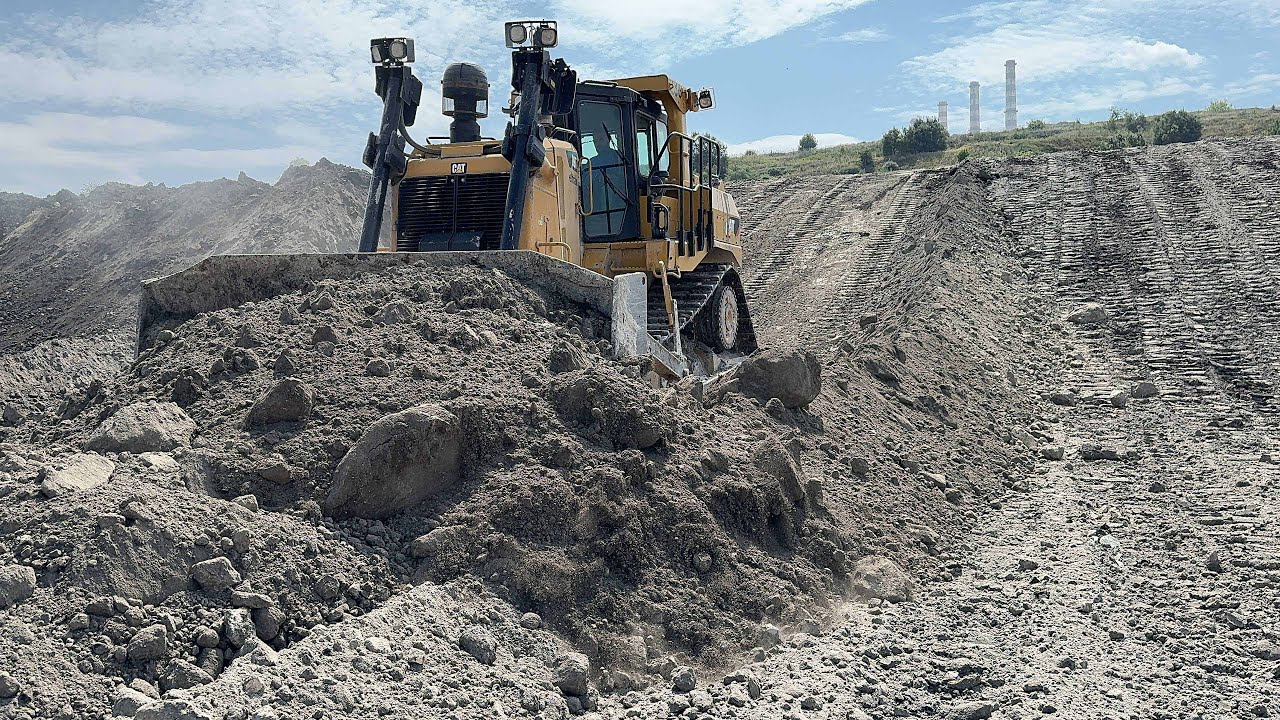 Two Caterpillar D9T Bulldozers Working For The Reclamation Of An Old ...