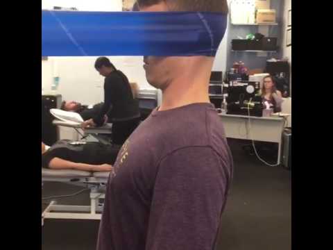 Chin tucks with band for neck strengthening. - YouTube
