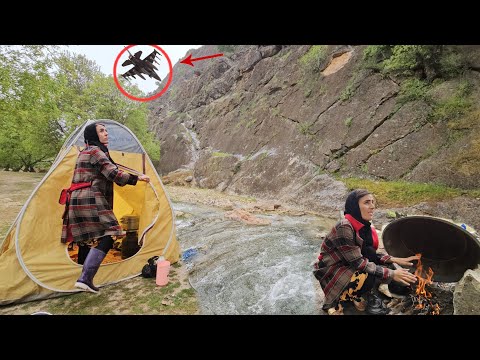 A nomadic mother's dangerous journey; a surprise in a severe storm and sound of a fighter jet