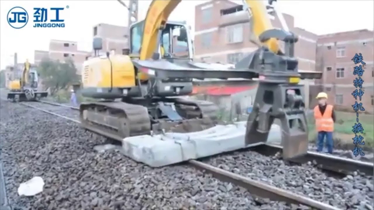 Railway ties sleeper changer machine railroad excavator working - YouTube