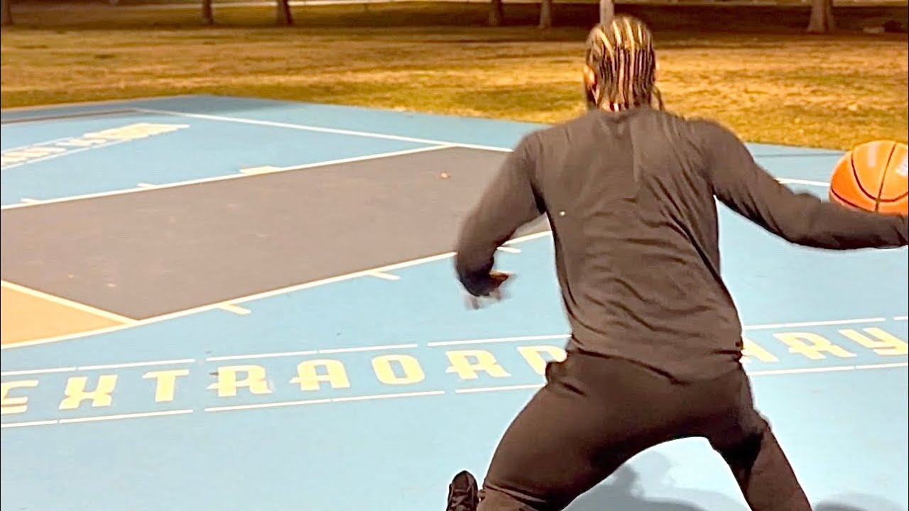 Solid handles and fakes to a hop step overhand layup finish - YouTube