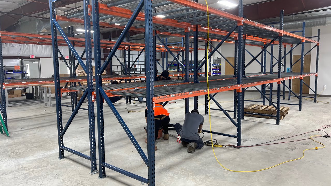 Teardrop pallet storage racking installation - Hillsborough, NC - YouTube