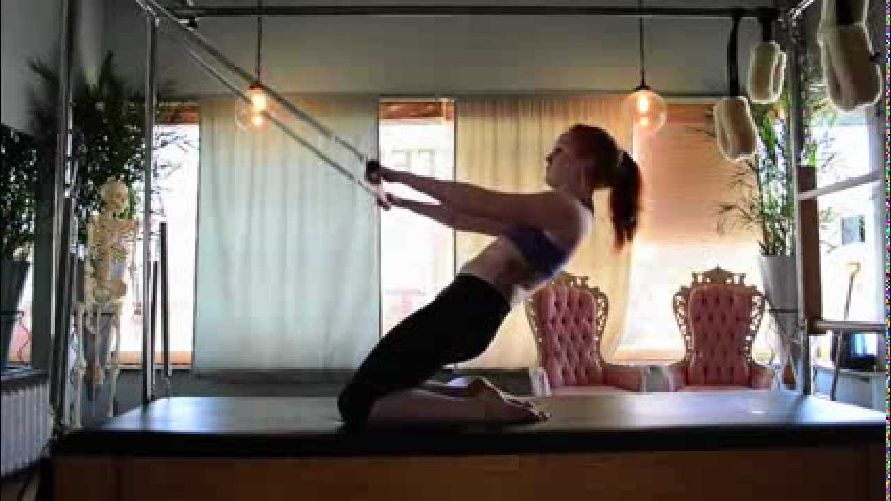 Pilates Chest Expansion - Thigh Stretch on Cadillac - YouTube