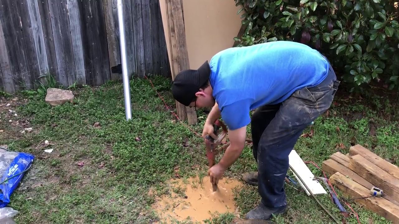 Easiest way to set a fence post (power washer and shop vac) - YouTube