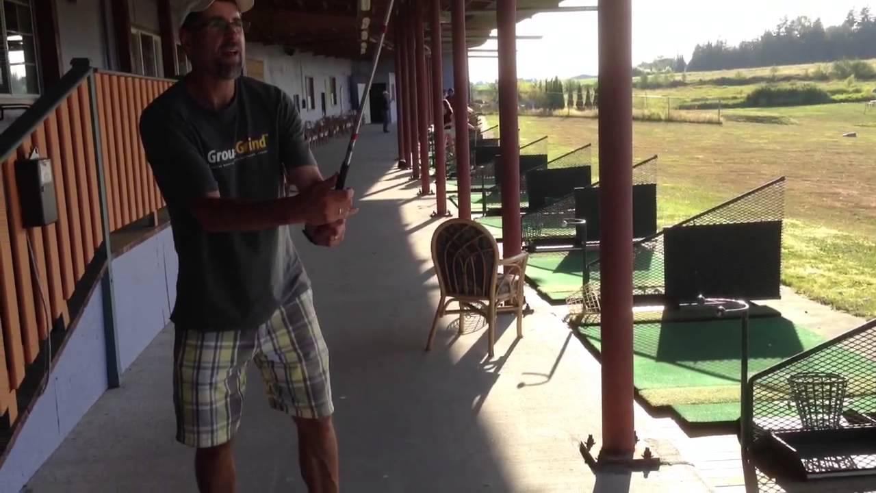 Doing the "Happy Gilmore" at the driving range - YouTube