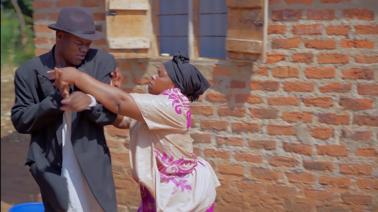Mbwali Brother Rooney & Olivia Kay OFFICIAL VIDEO - YouTube