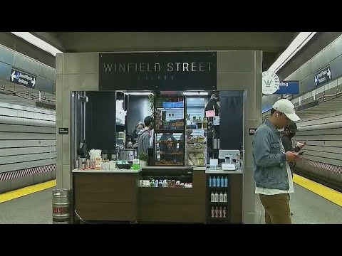 Coffee shop opens on subway platform - YouTube