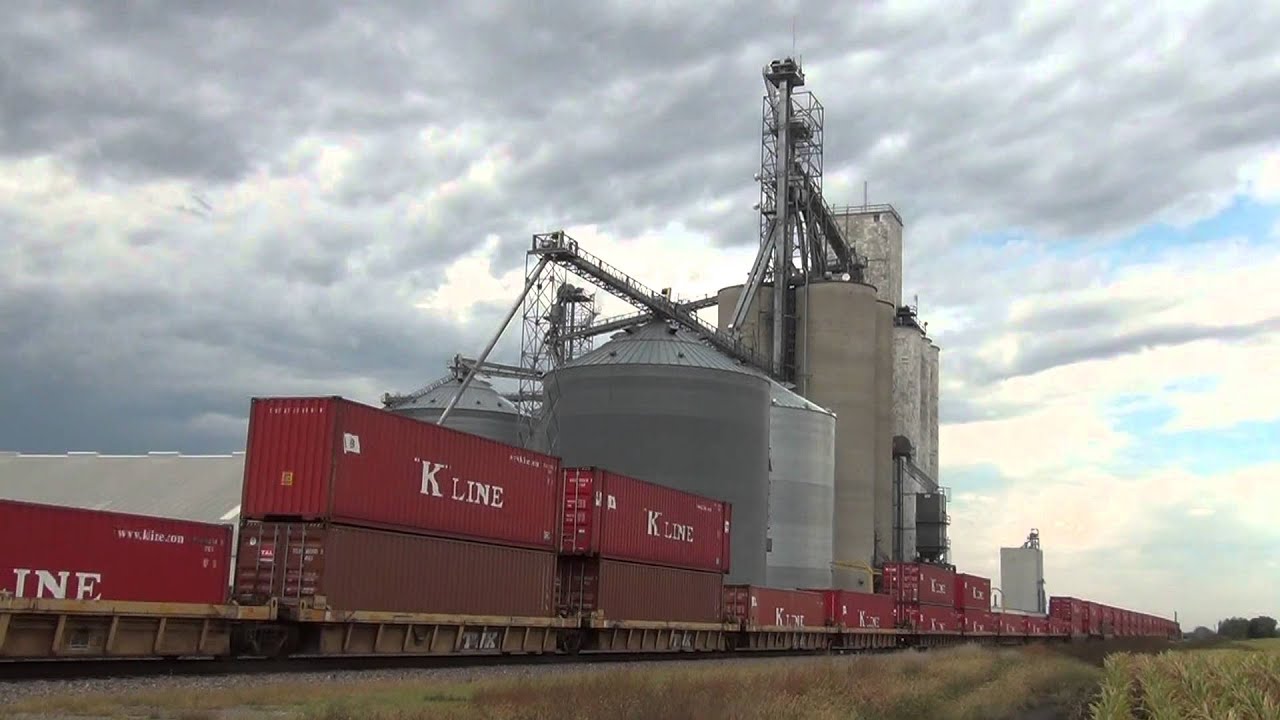 Union Pacific red K-Line stack train at ethanol plant, Nevada, Iowa ...