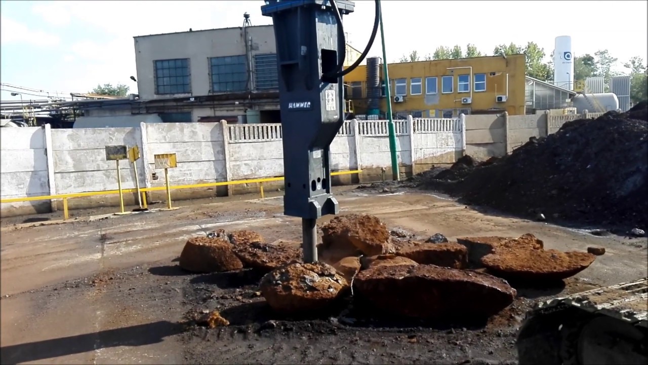HAMMER HM1700 Hydraulic breaker crushing slag and iron in Poland - YouTube