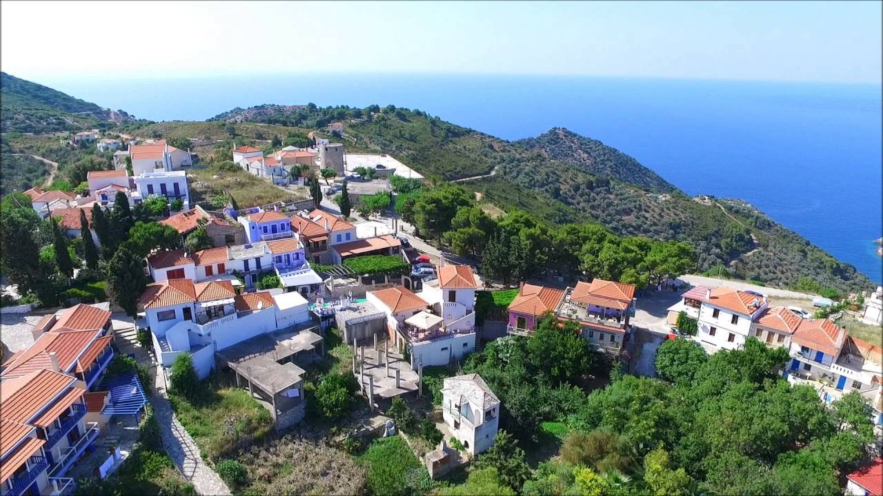 The old town (Chora) of the Greek Island of Alonissos from the air ...
