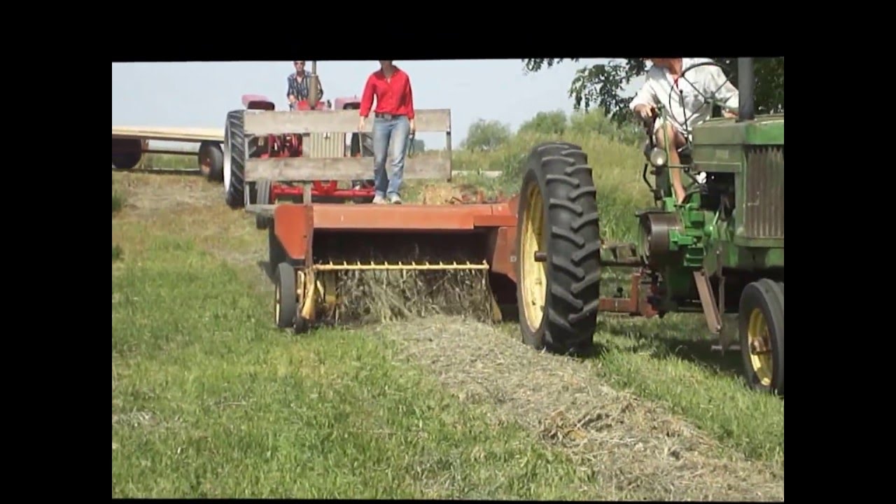 Baling Hay with a john deere 70 and a new holland baler - YouTube