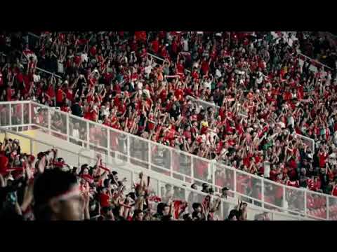 JAKARTA, INDONESIA - JANUARY 14, 2018: Action in slow motion of Indonesian football supporters