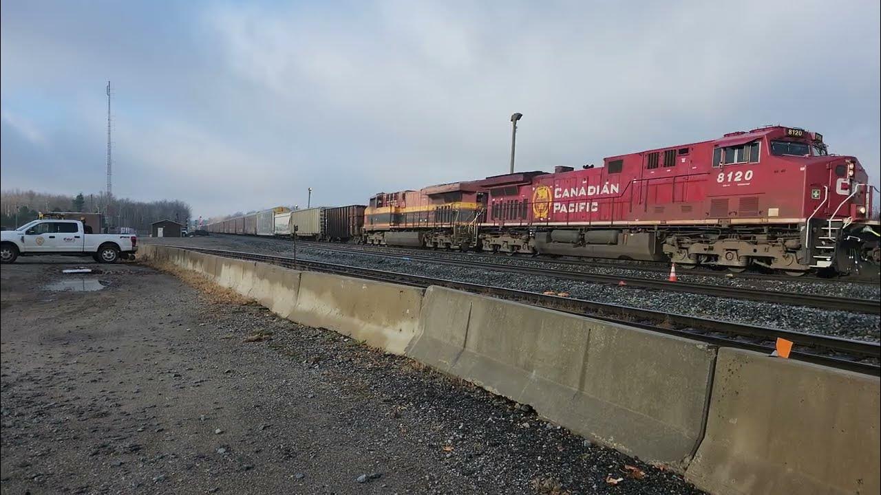 CP 8120 & KCS de M 4730 lead an eastbound passed a very full Guelph Jct yard - YouTube