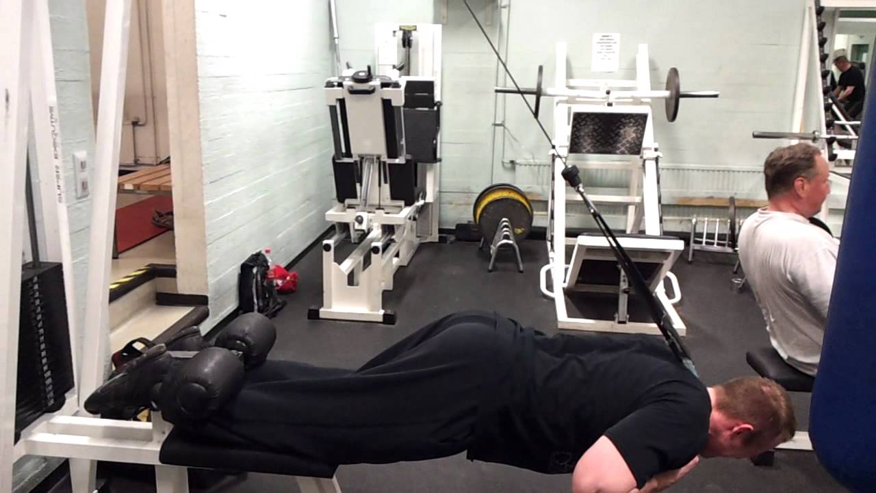 Glute ham raise in lat-pulldown machine - YouTube