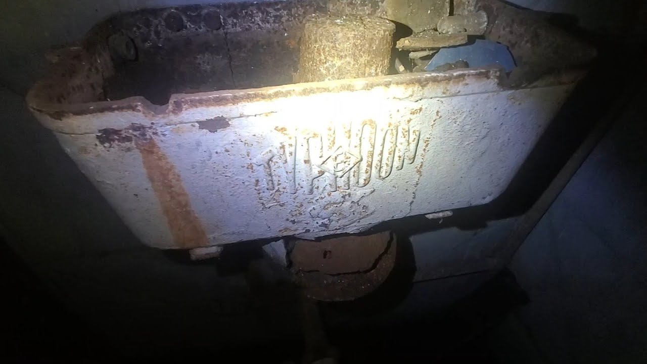 Low Level 1935 Typhoon Cast Iron Cistern in Ruins - YouTube