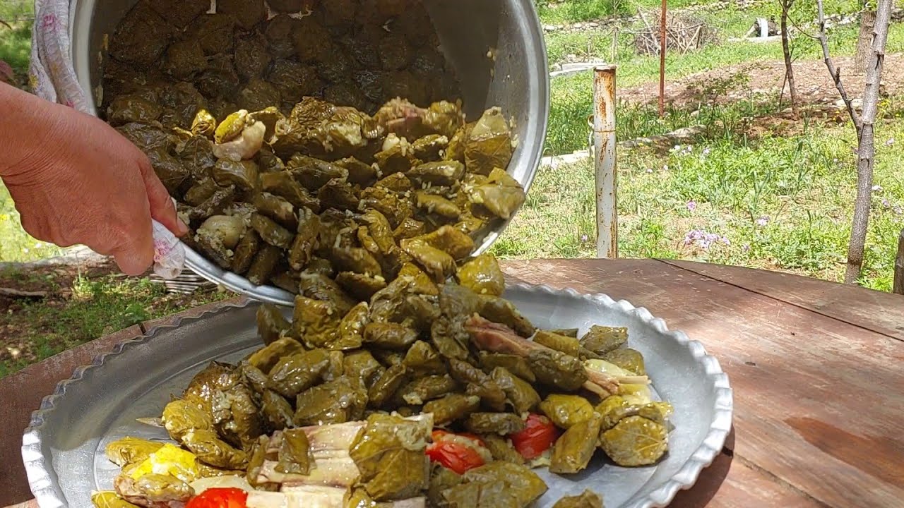 How to make dolme with chicken and grape leaves.Making Delicious Dolme ...
