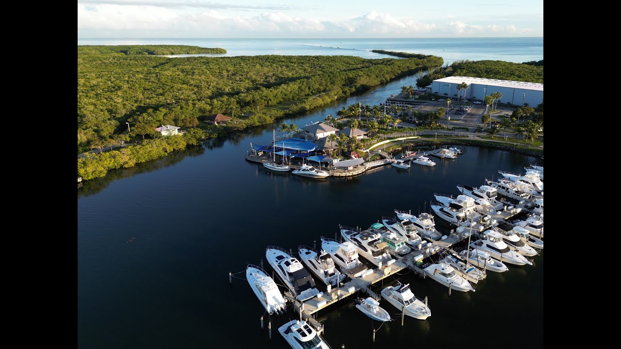 A mesmerizing flight over the Black Point Marina in South Florida! TURN ...