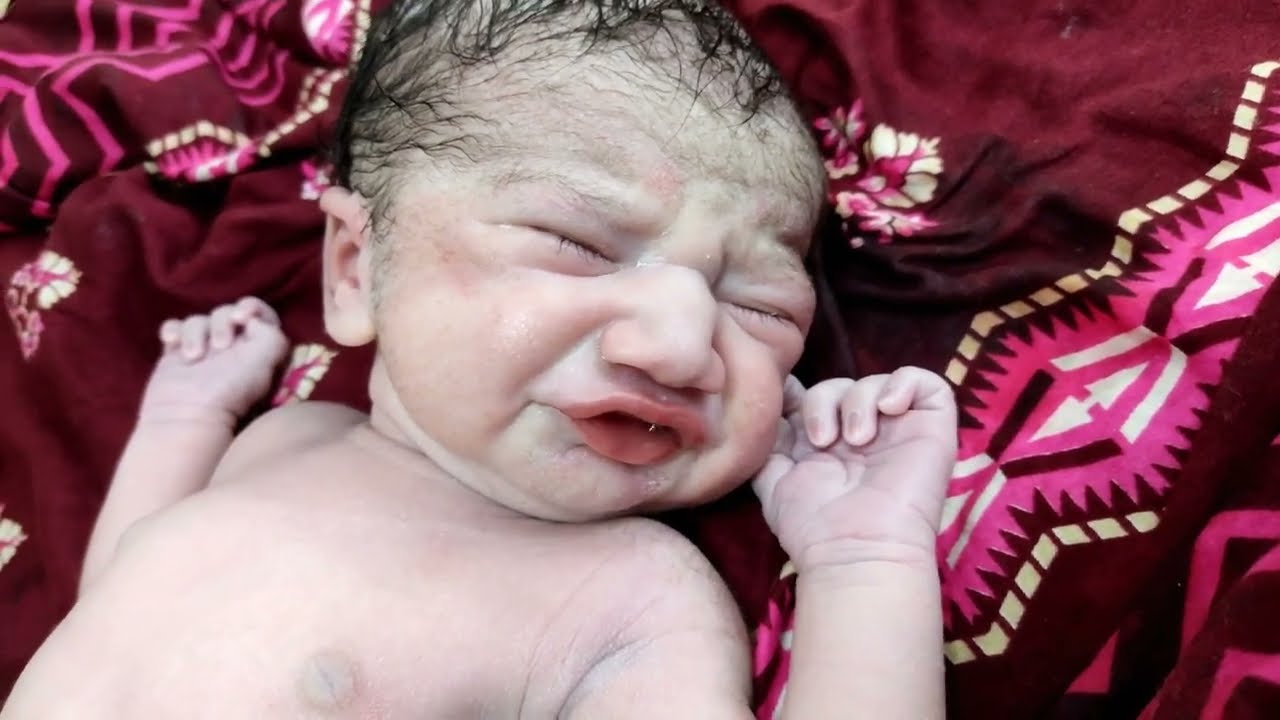 Adorable baby Girl with pouty lips after birth is so cute , whom she ...