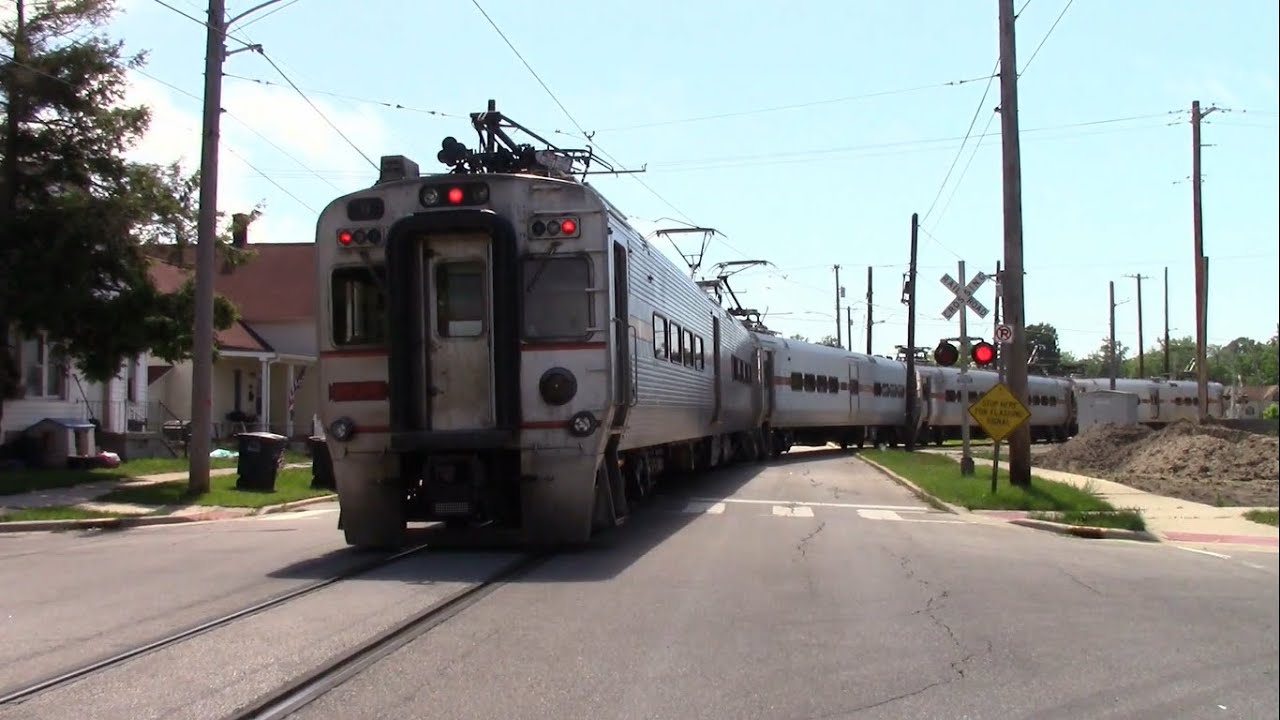 NICTD Train #118 Street Running on 11th and 10th Streets + Beach Shots ...