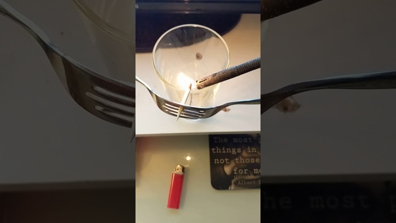 Glass balancing fork match/stick trick - YouTube