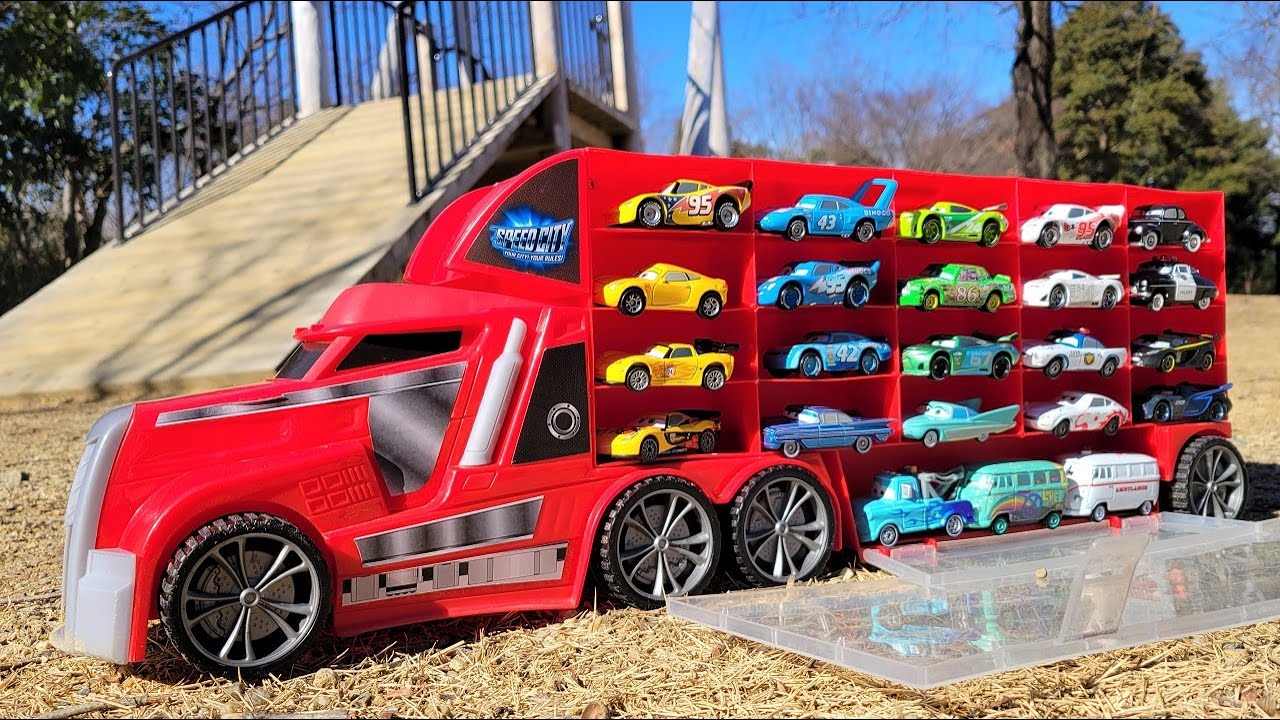 A big truck looks for a "colorful miniature car" in a wooden square ...