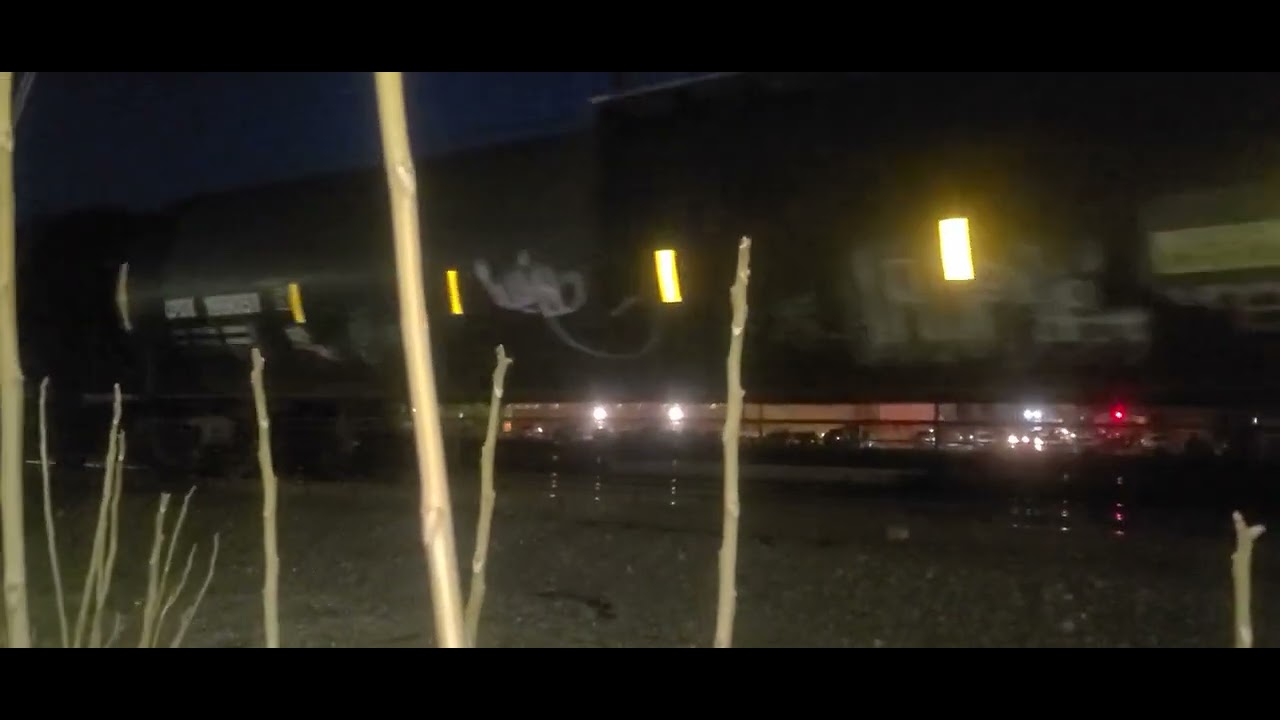 Union Pacific 8163 leads a manifest with NS 8012 in Roseville, CA - YouTube