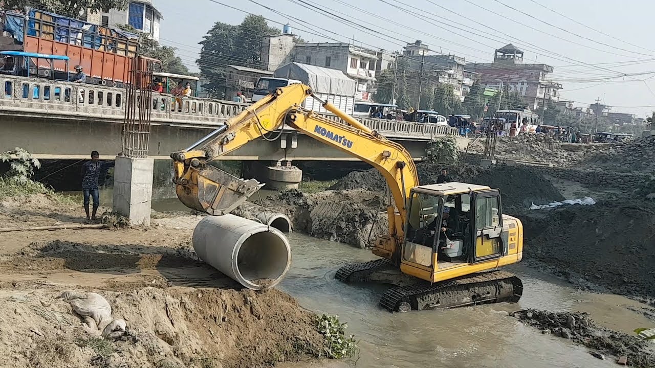 Excavator Lifting Heavy Culvert Pipe - Powerful Excavator - YouTube