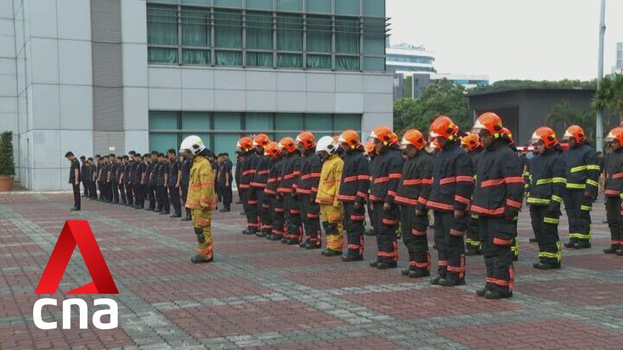 SCDF officers pay tribute to fallen NSF firefighter Edward H Go - YouTube