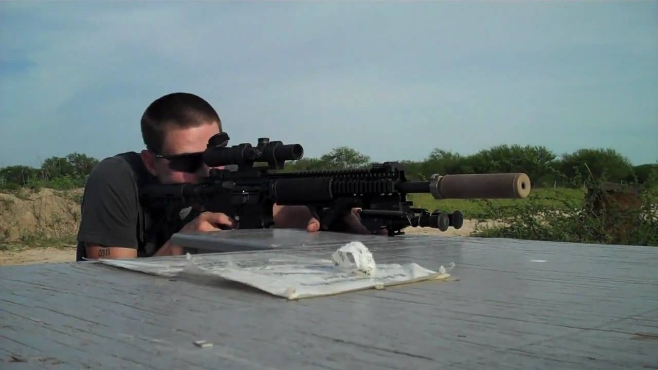 BCM 16" Mid-length AR15 (with Surefire Suppressor) shooting steel - YouTube