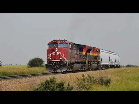CPKC Train 242 with CP Rail AC4400CWM 8034 and KCS SD70ACe 4112 on the Red Deer sub - YouTube