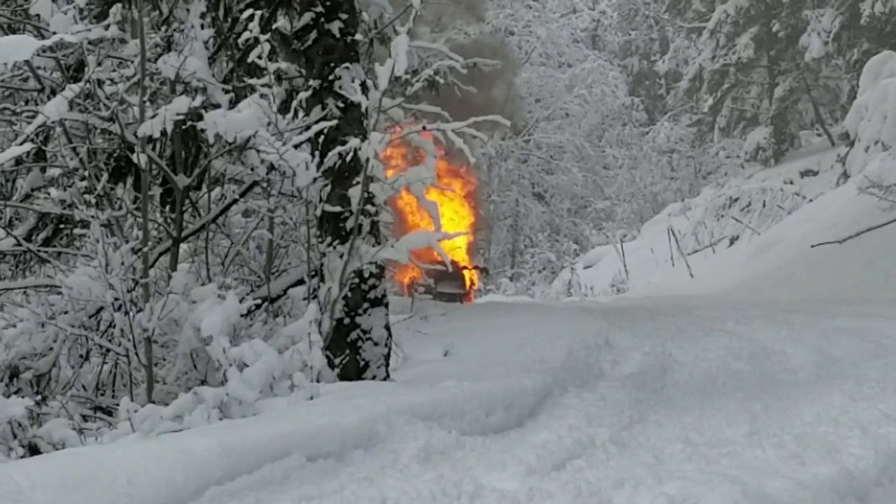 Snowmobile fire - YouTube