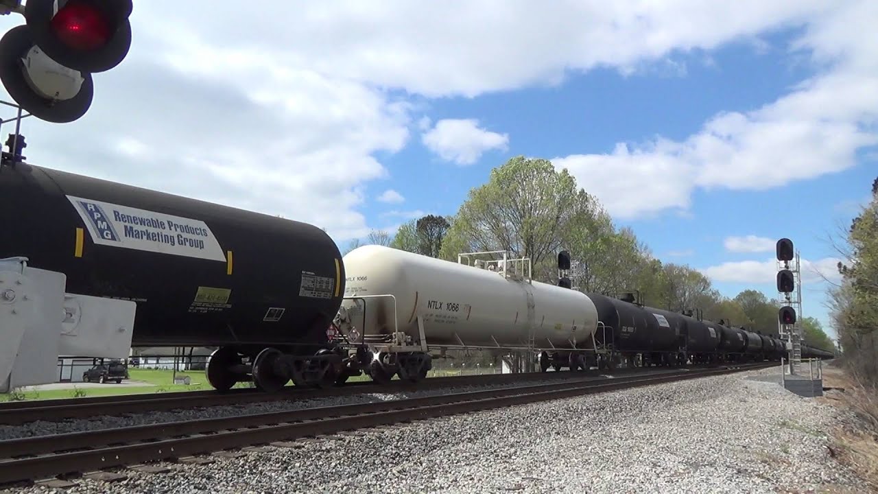 CP 9838 (GE ES44CW) leads NS 64J - YouTube