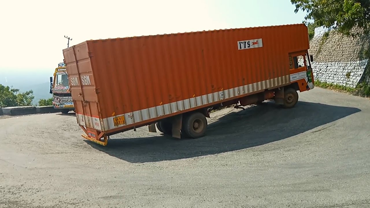 Long Size Container Lorry And Load Lorry Turning Risk Driving Ghat Road ...