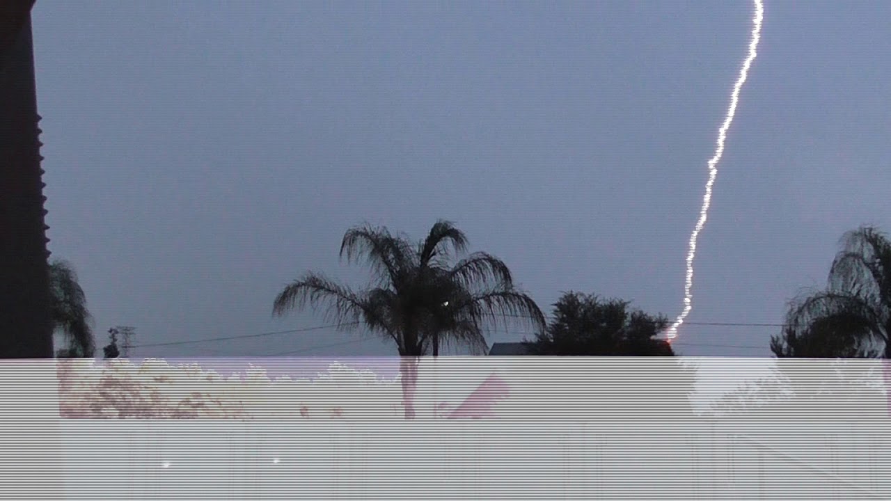 Lightning strike hits electricity pylon in slow motion - YouTube