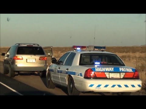 ABANDONED CAR, EMPTY POLICE CAR with LIGHTS FLASHING, man walking in ...