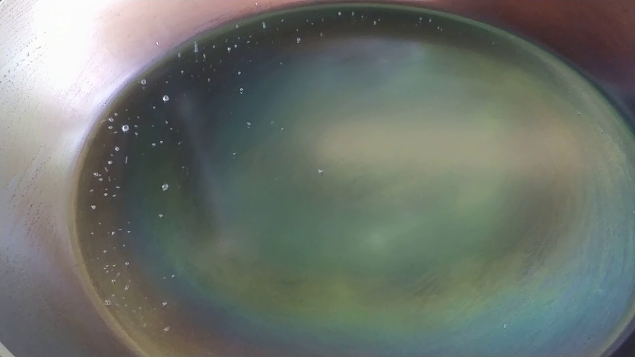 Water dancing on a hot new frying pan - YouTube